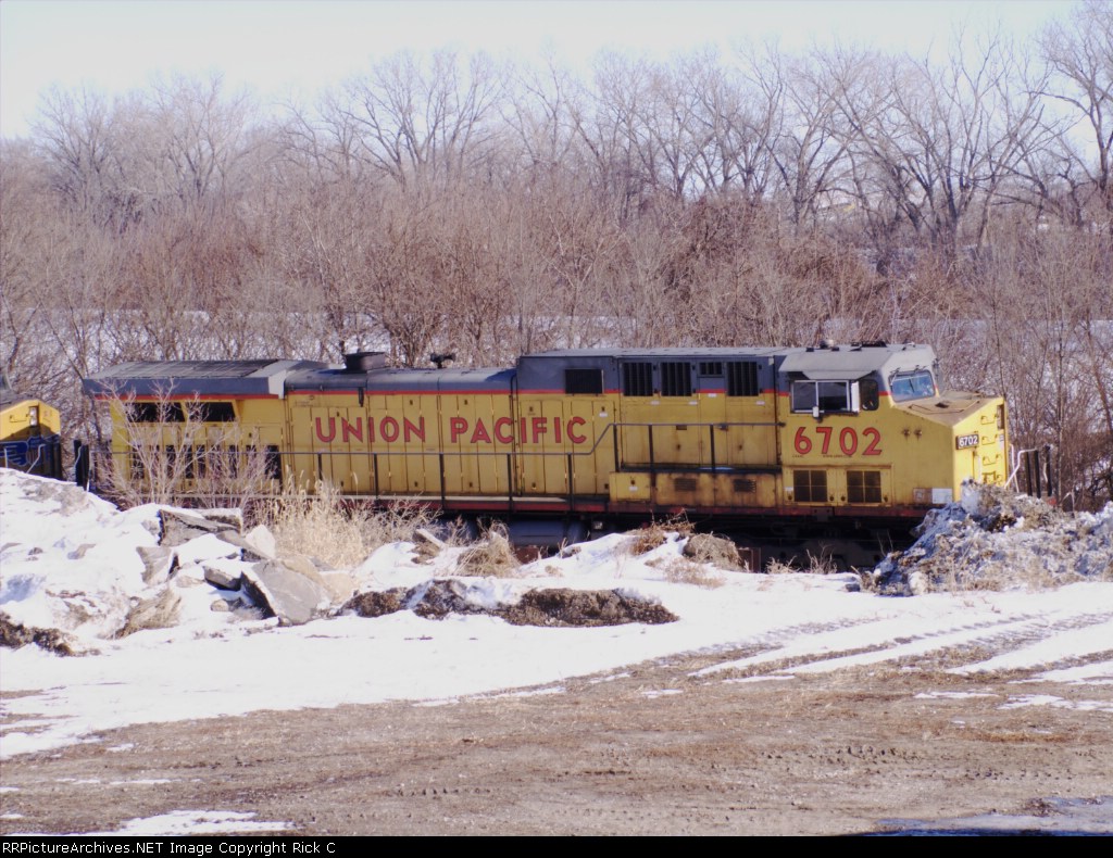 UP 6702 Leads Coal Empties WB